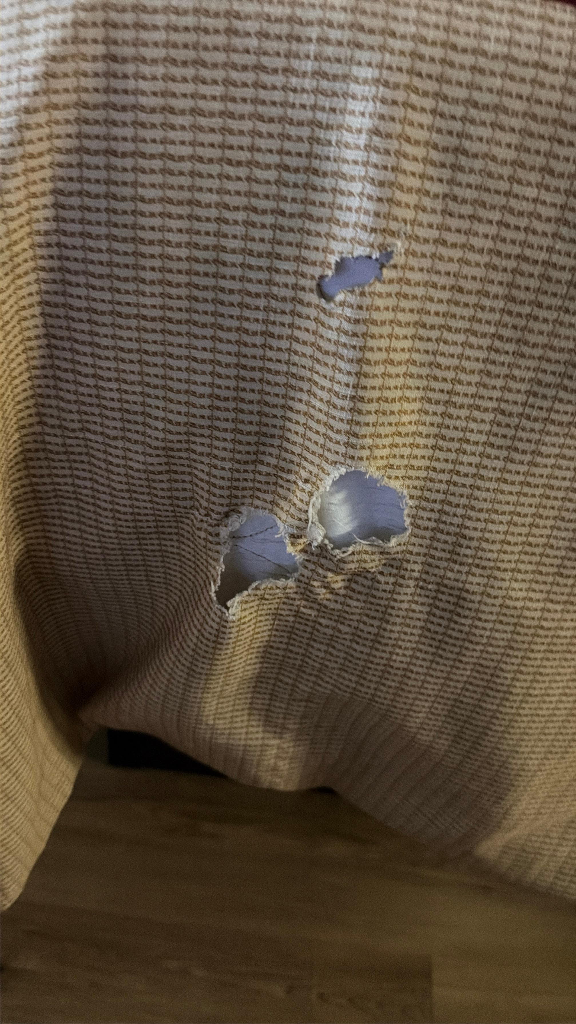 Holes in the bed spread as well. The room was unclean.