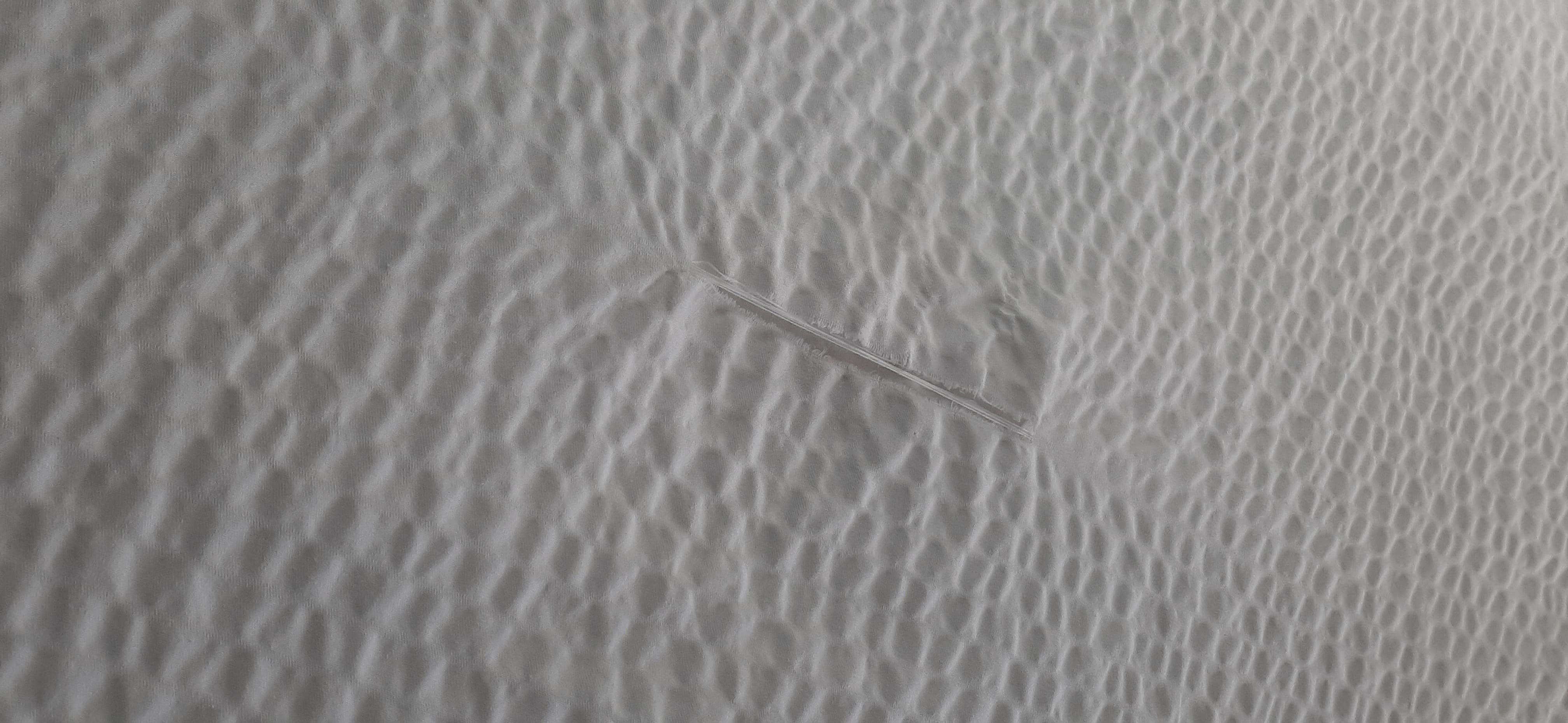 Tear in comforter. Sheets and pillowcases had stains.