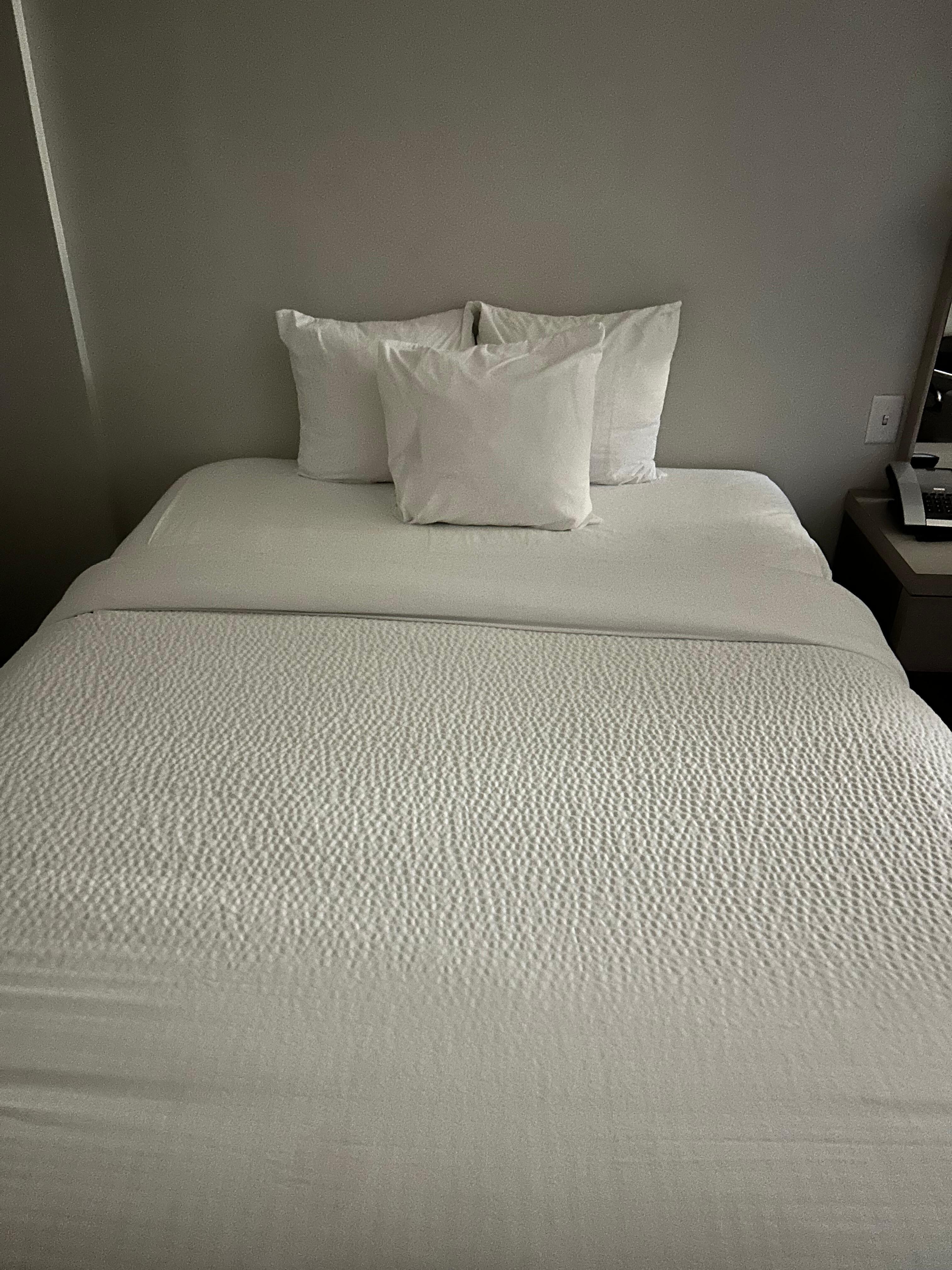 Only 3 pillows available on each bed 