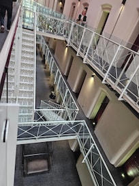 hallway of main rooms. looks like the old cell block. so cool