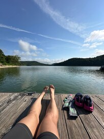 A dock where one can sit and enjoy the sun and peace
