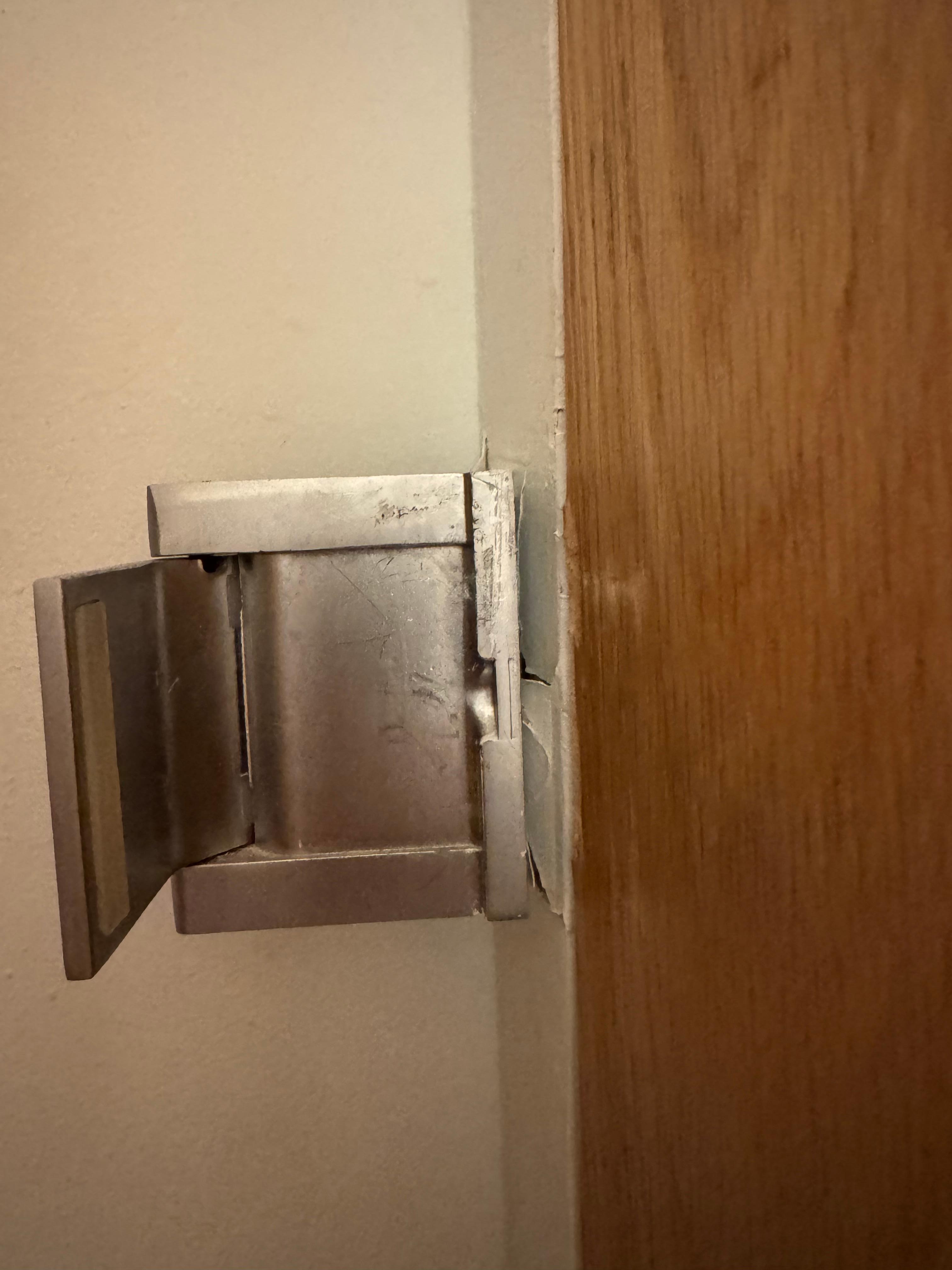 Broken and coming out of the wall