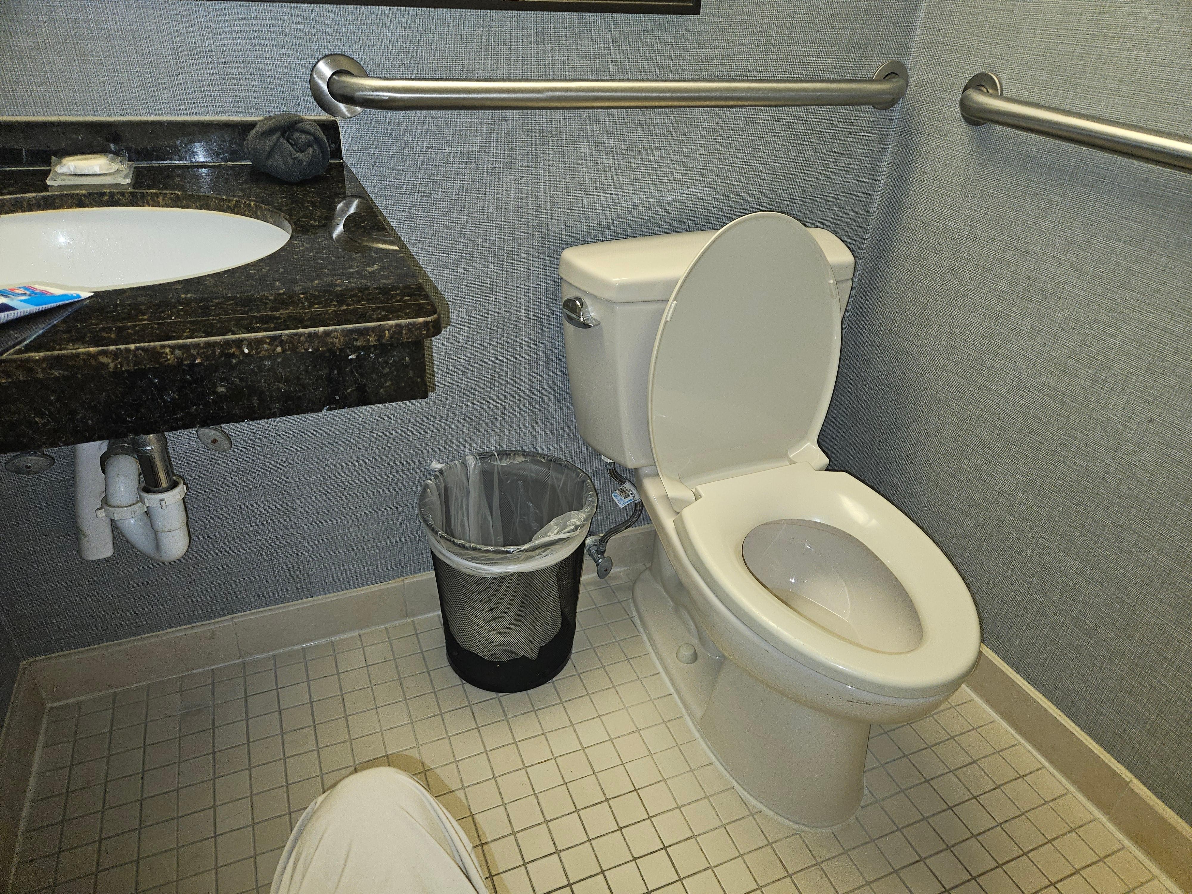 Couldn't get wheelchair on the side of toilet because of sink in the way