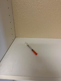 Hypodermic needle found in kitchen drawer