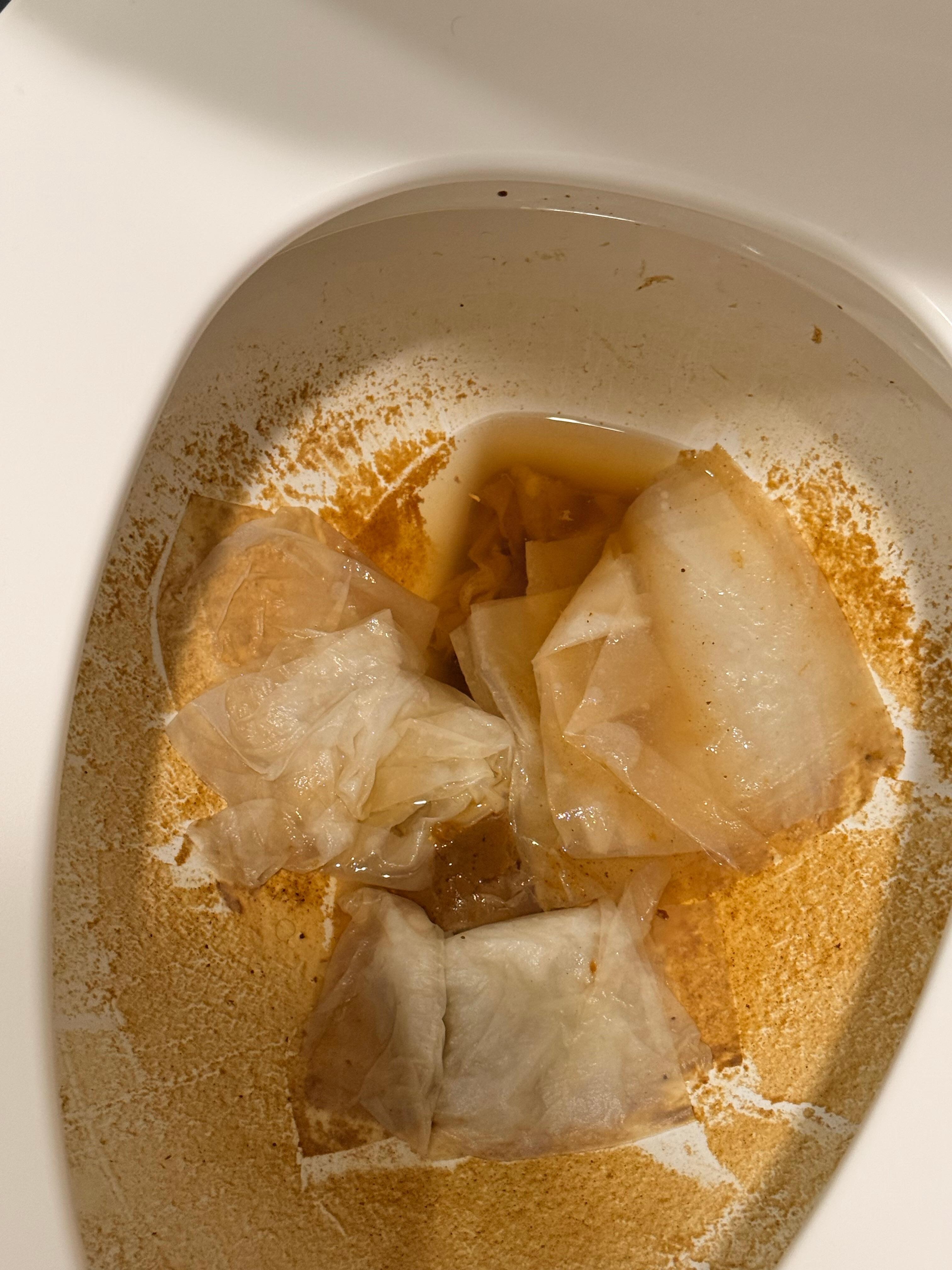 Waste that was bagged up in toilet and if you flush it will fill up to the rim and still not flush