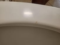Stain on toilet seat, the toilet lid was also broken