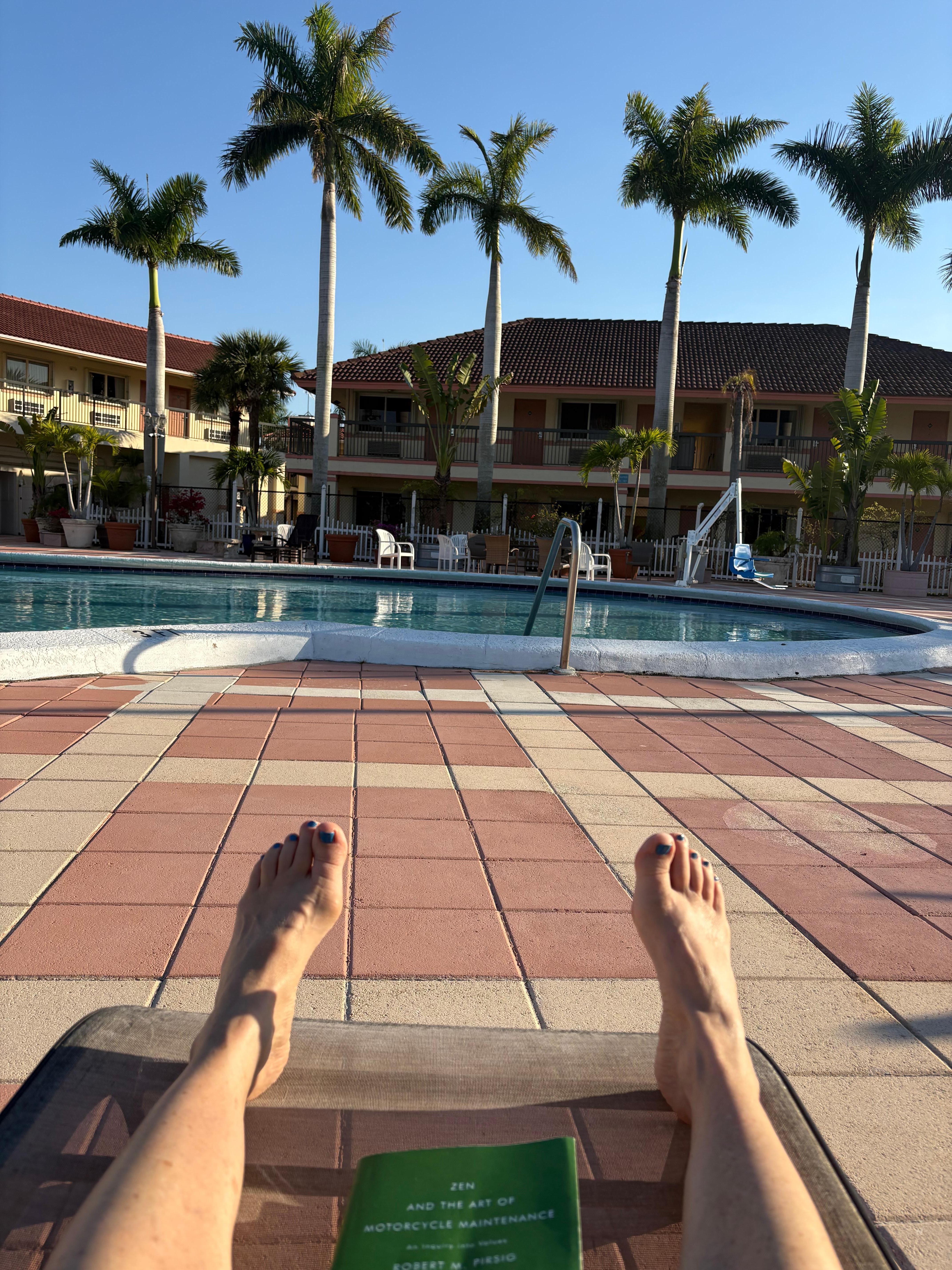 Relaxing bye the pool in March! The pool was clean and absolutely marvelous! 