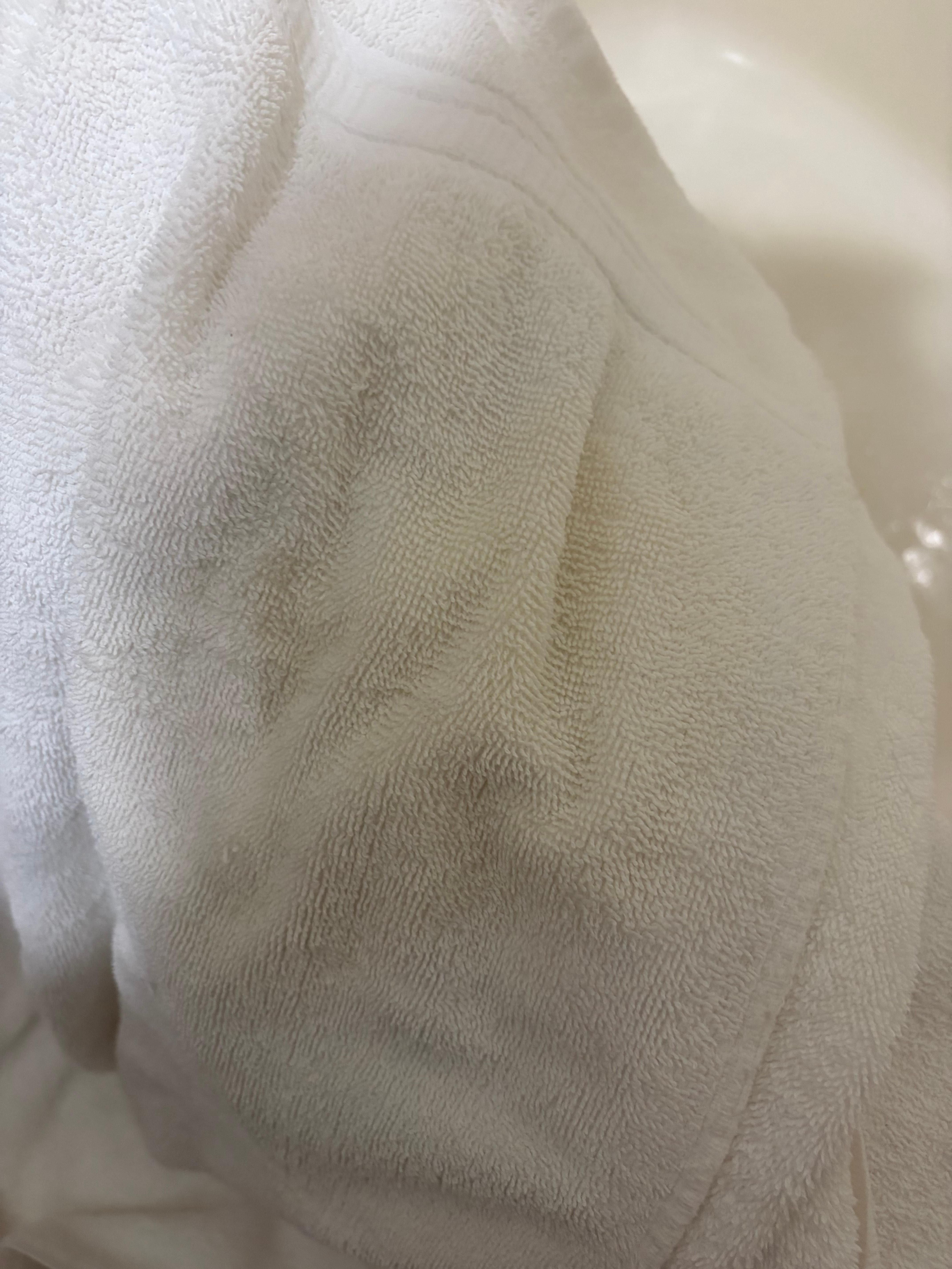 Yellow spots on towels 