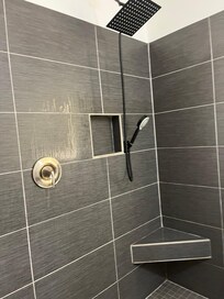 That shower head is a dream!