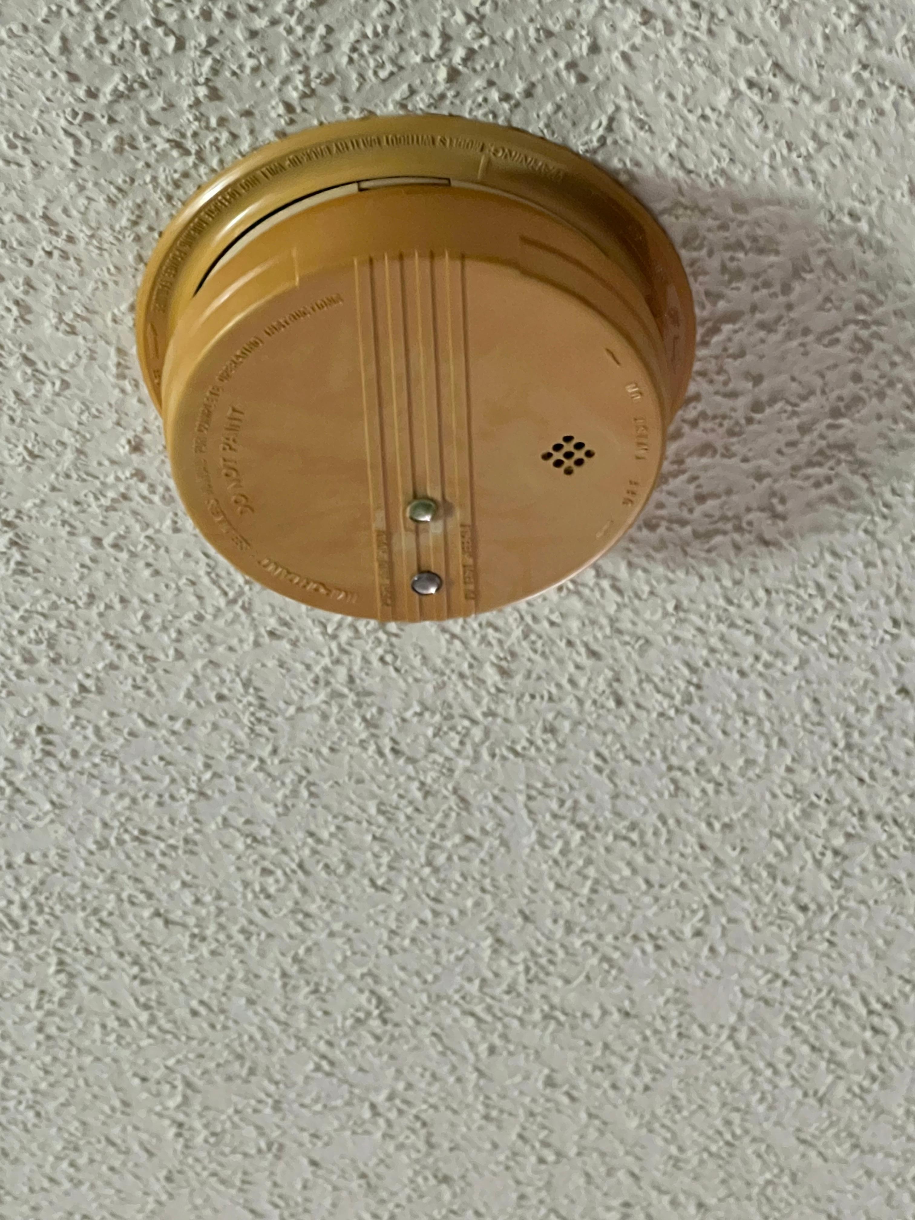 Very discolored smoke detector. 