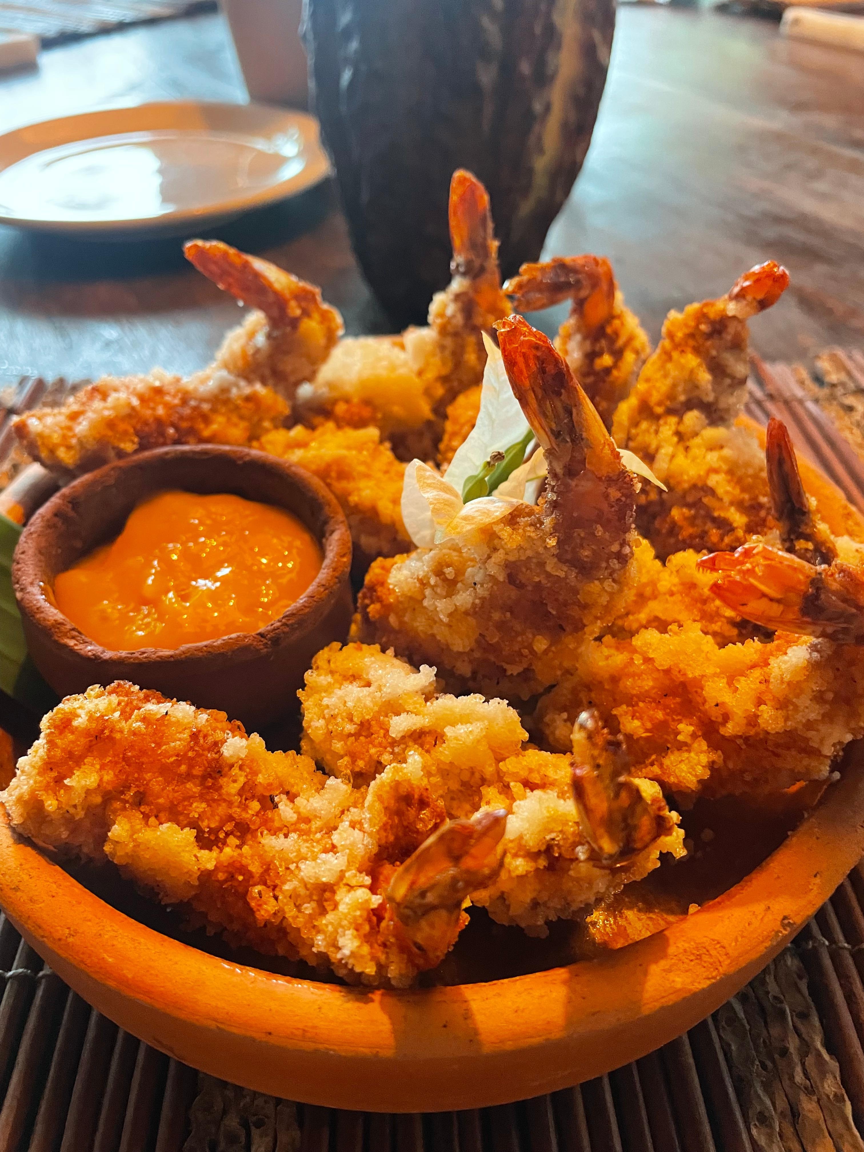 Recomendo o camarão empanado com côco