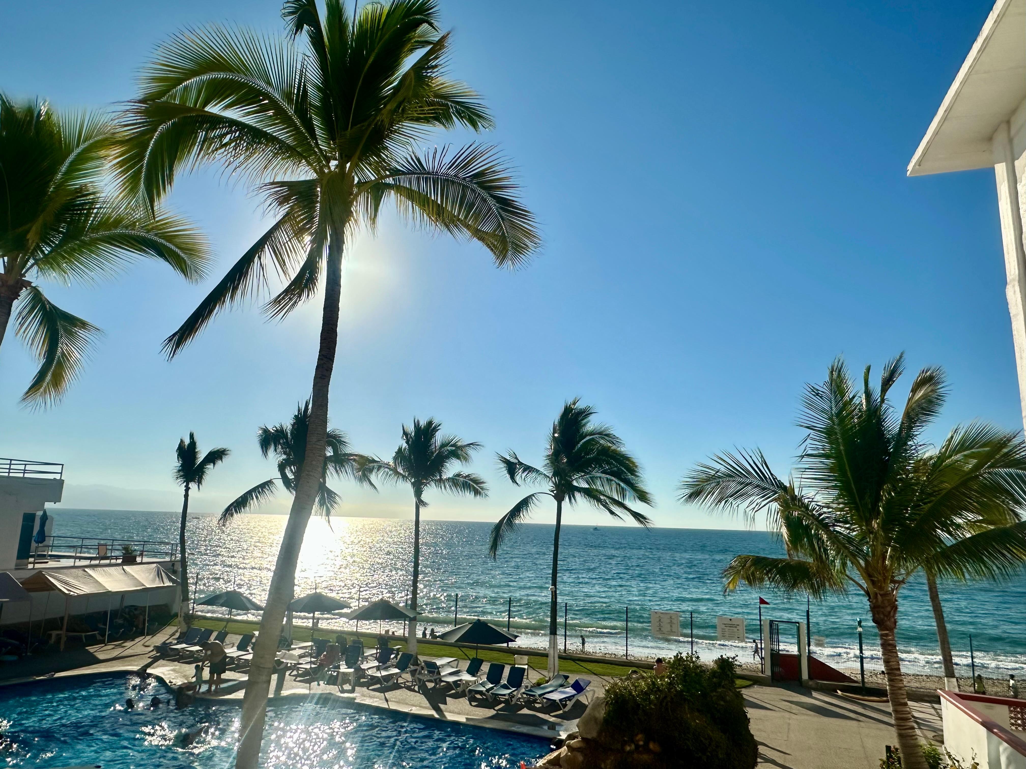 Next to the ocean with a beautiful view by the pool area. 