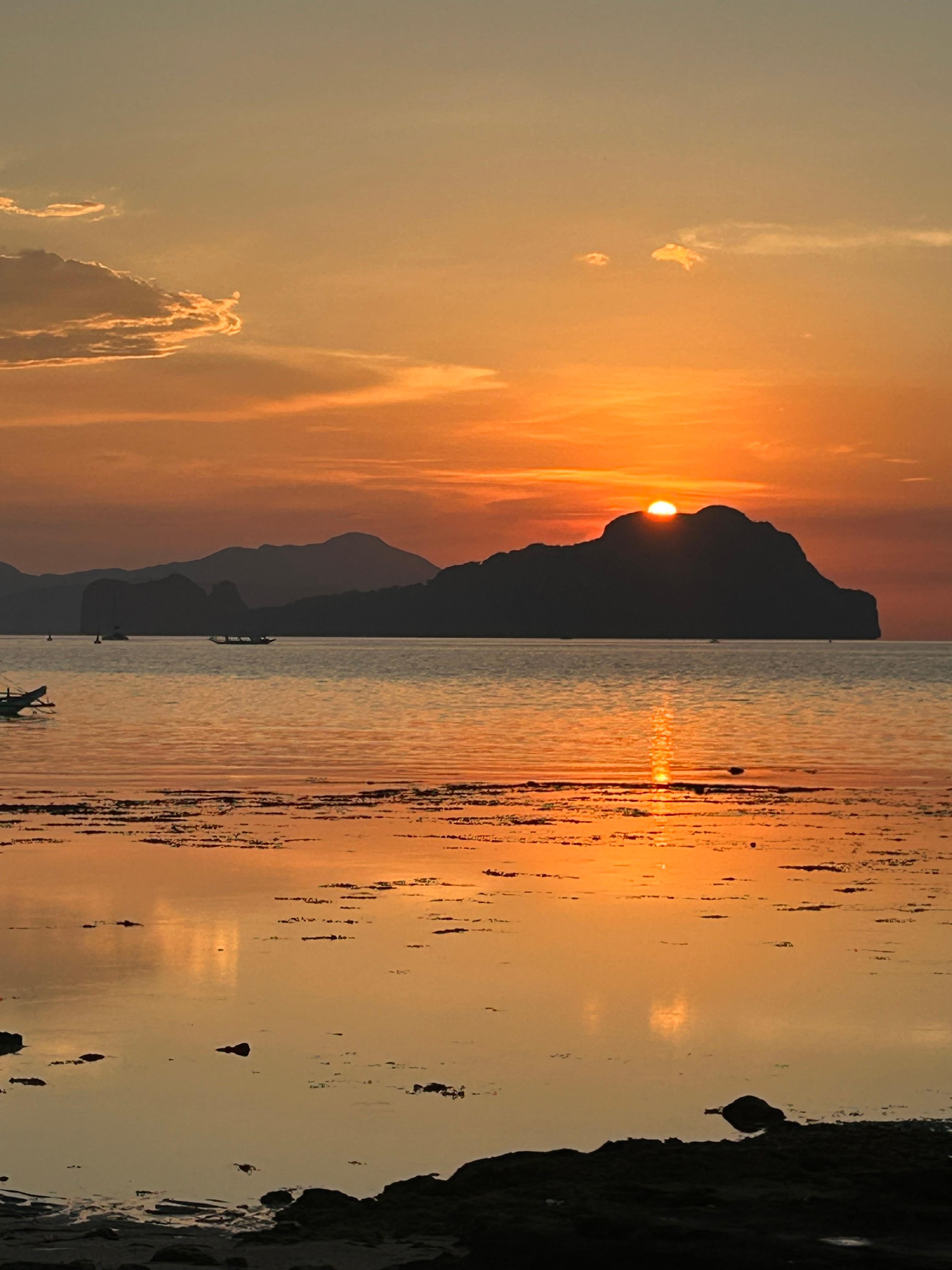 Sunset on helicopter island during happy hour