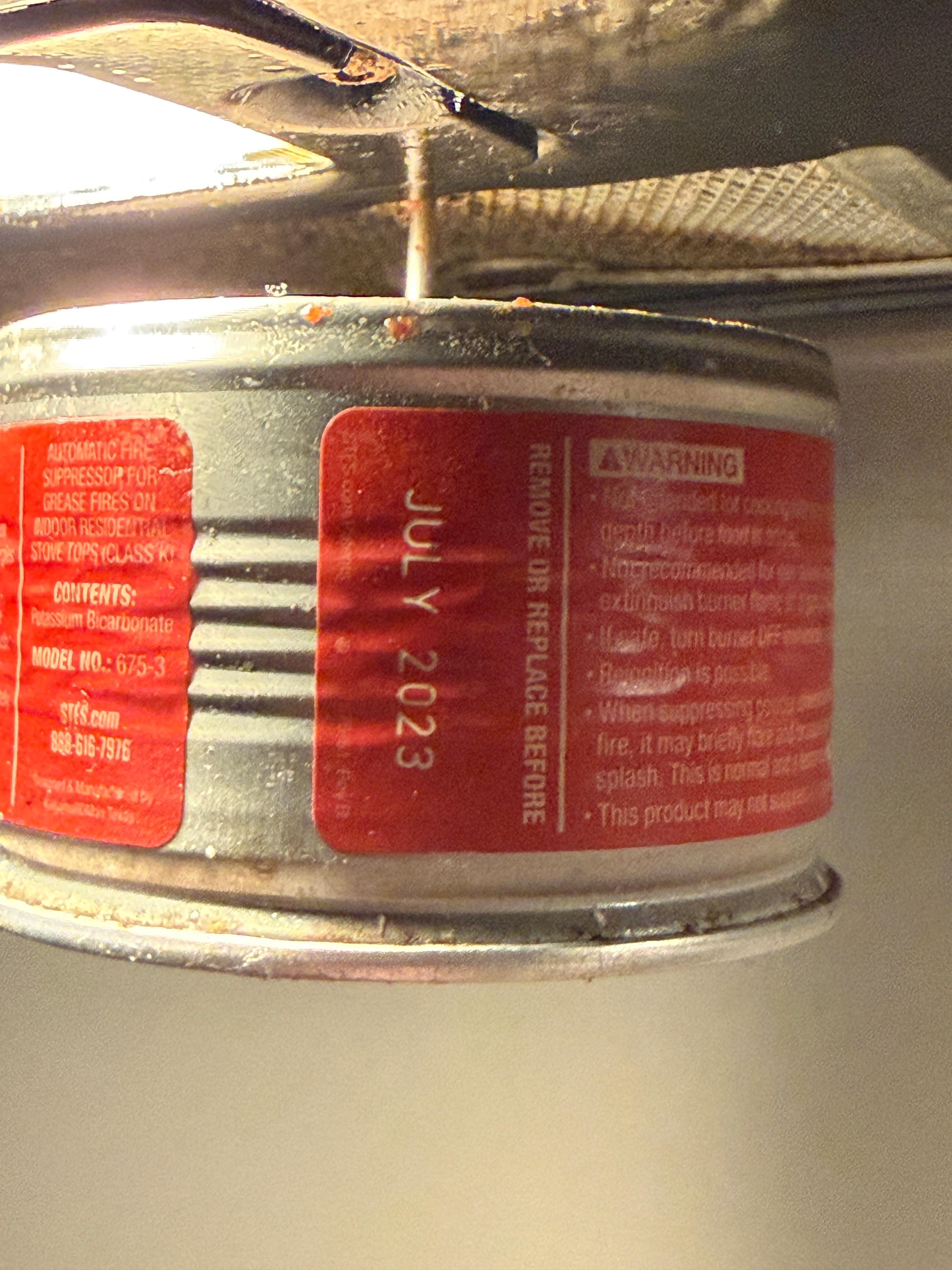 Expired fire extinguisher.