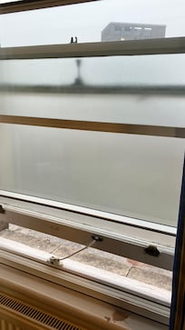 Ingrained grime on window frame