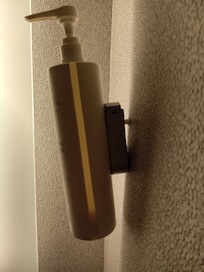 Lotion dispenser falling off wall