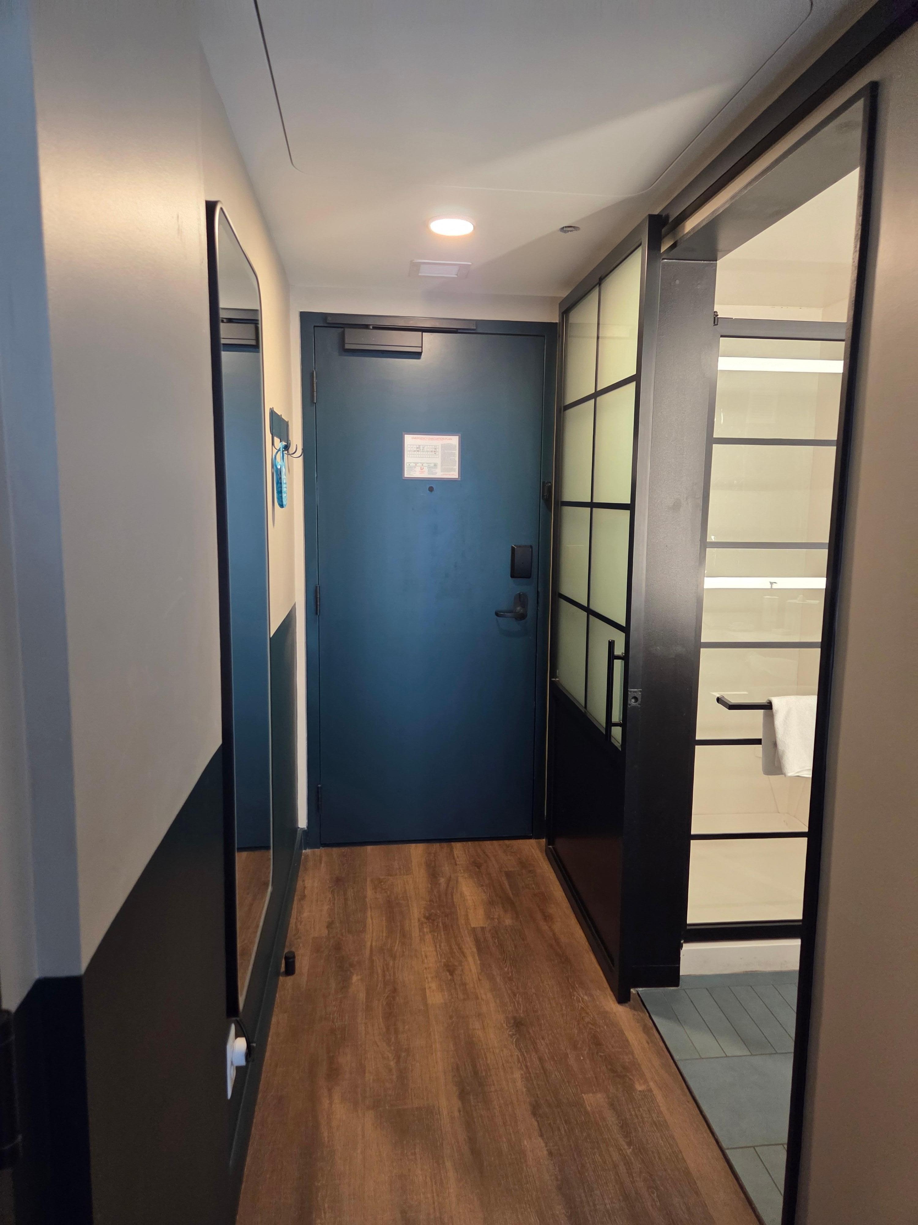 Mini hallway from door to room 