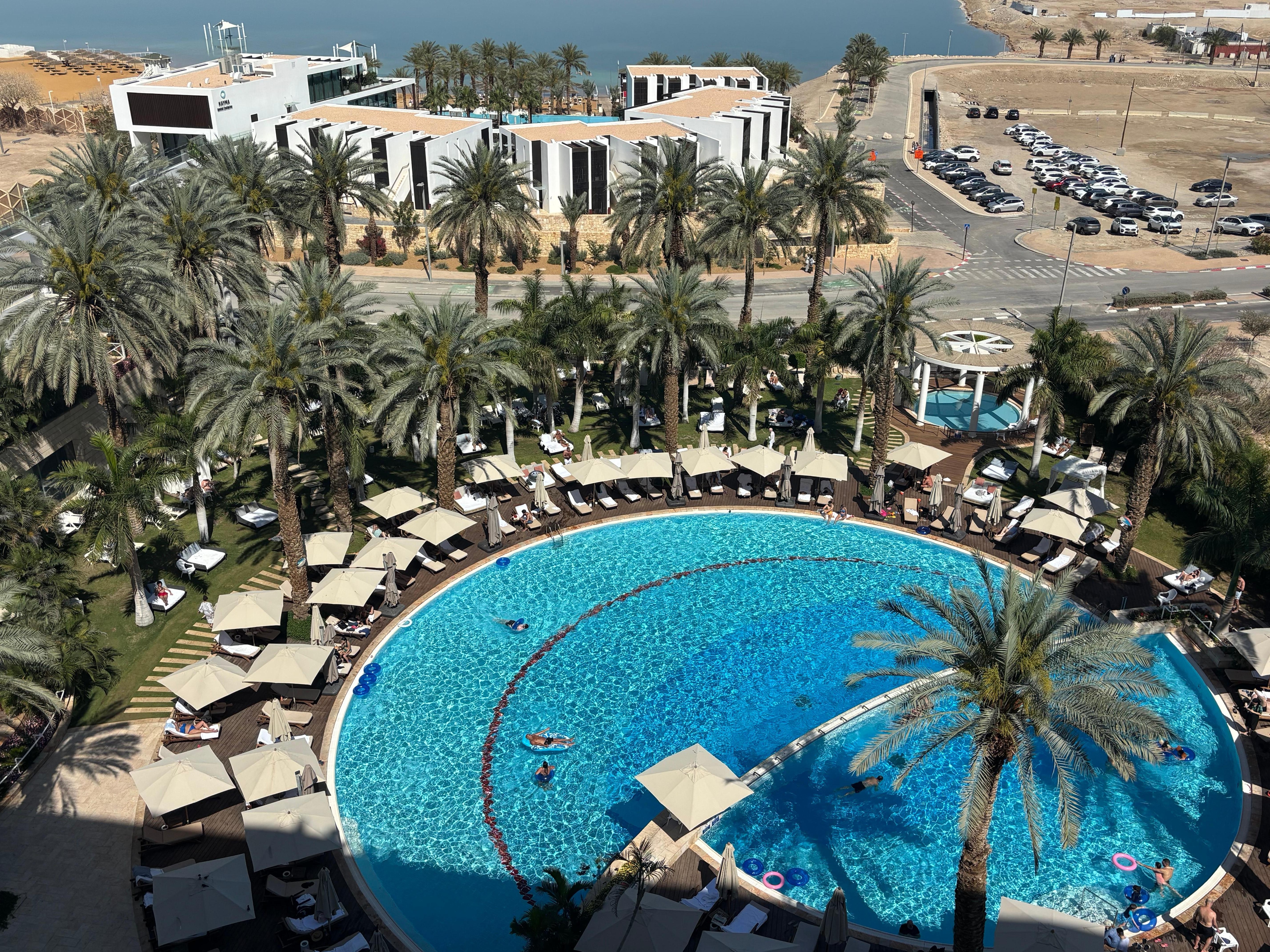 All rooms overlook pool and close private beach