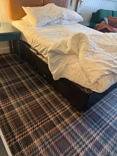 Bed base flaking and peeling which will make it difficult to clean and will harbour germs.