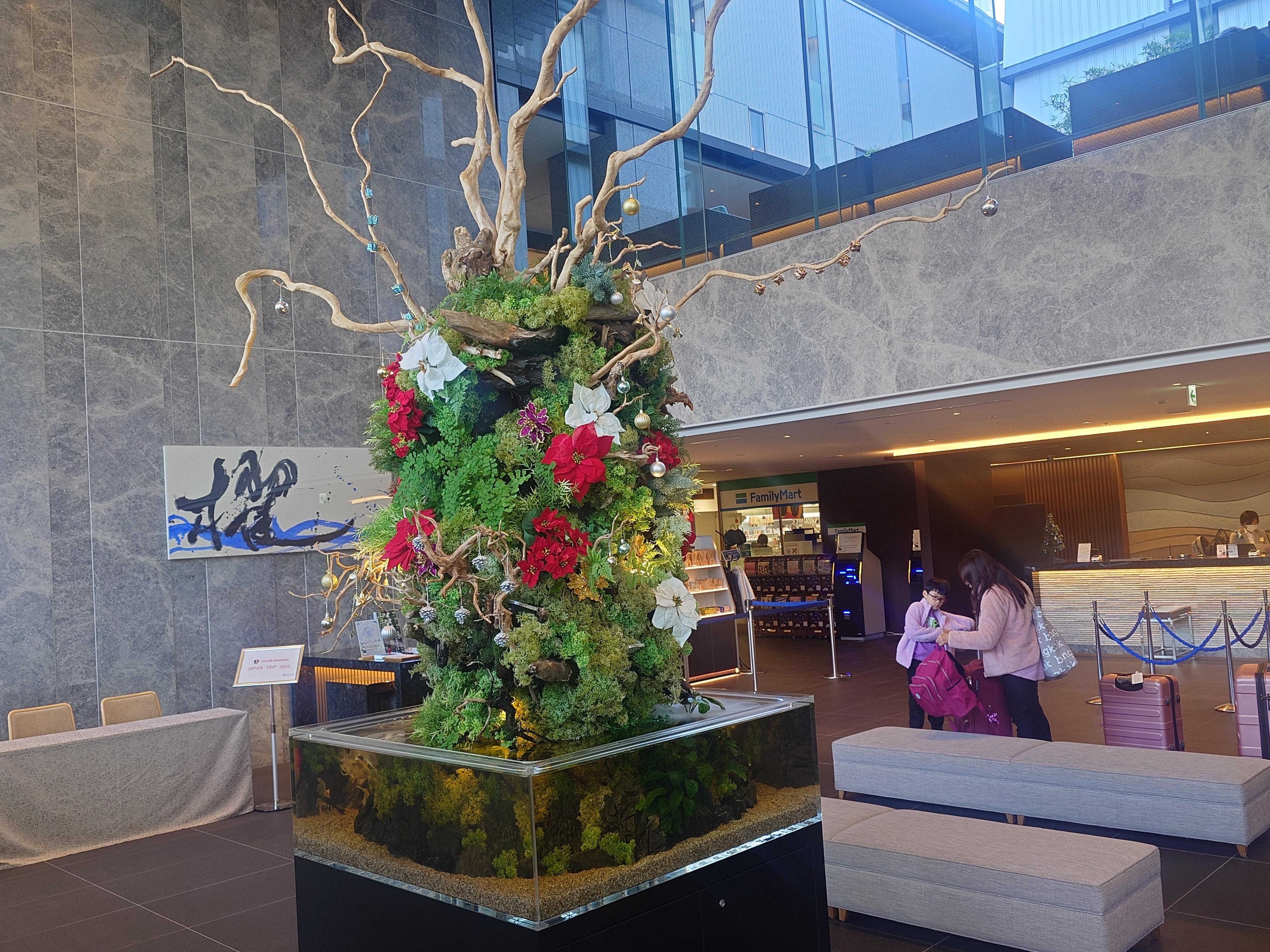 Unique Christmas tree in a tank with fishes. 