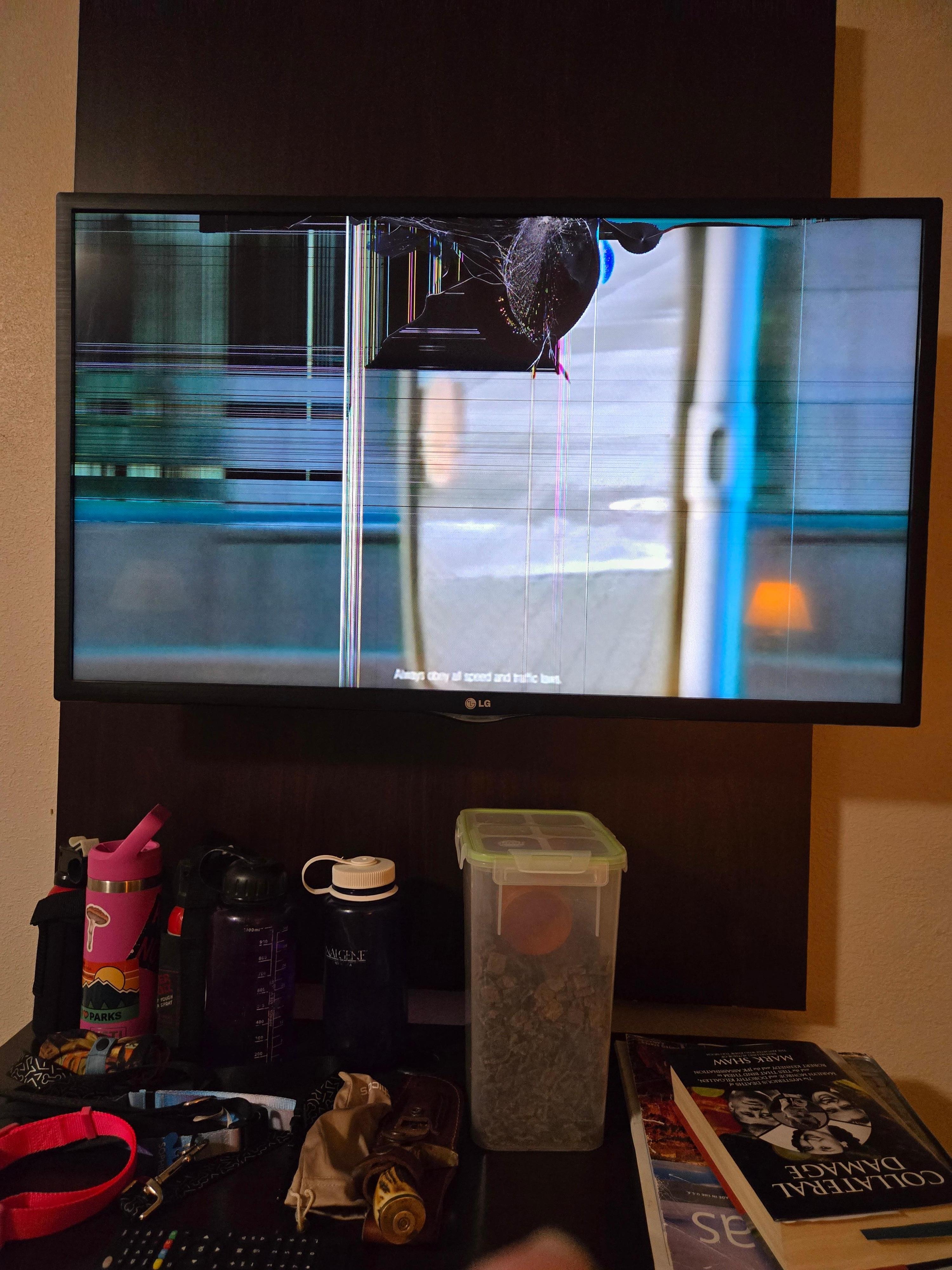 Broken tv. Looks like someone through something at it.