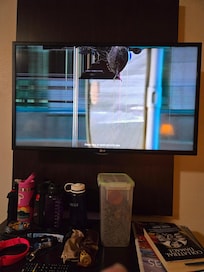 Broken tv. Looks like someone through something at it.