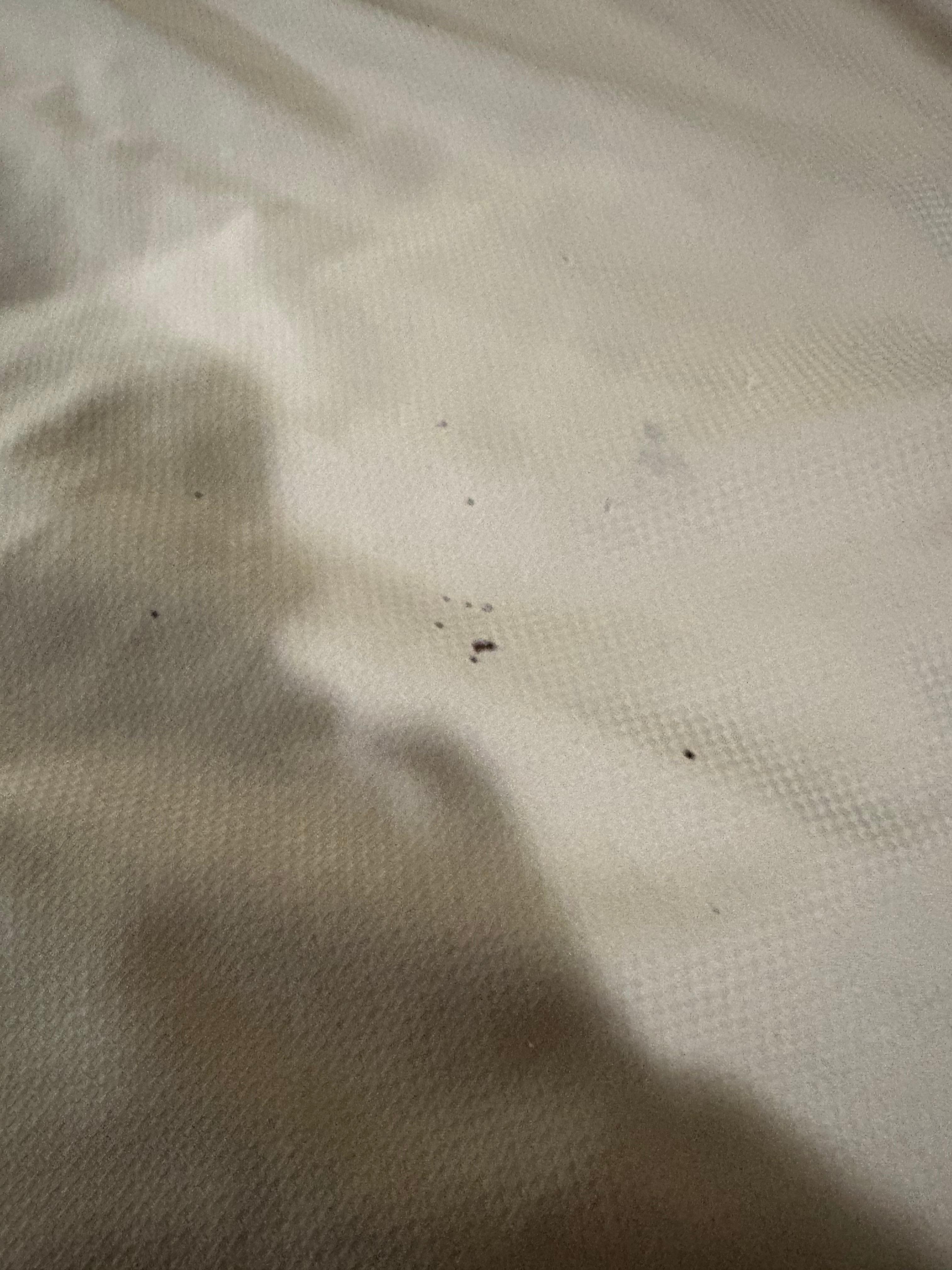 Burn holes in comforter 