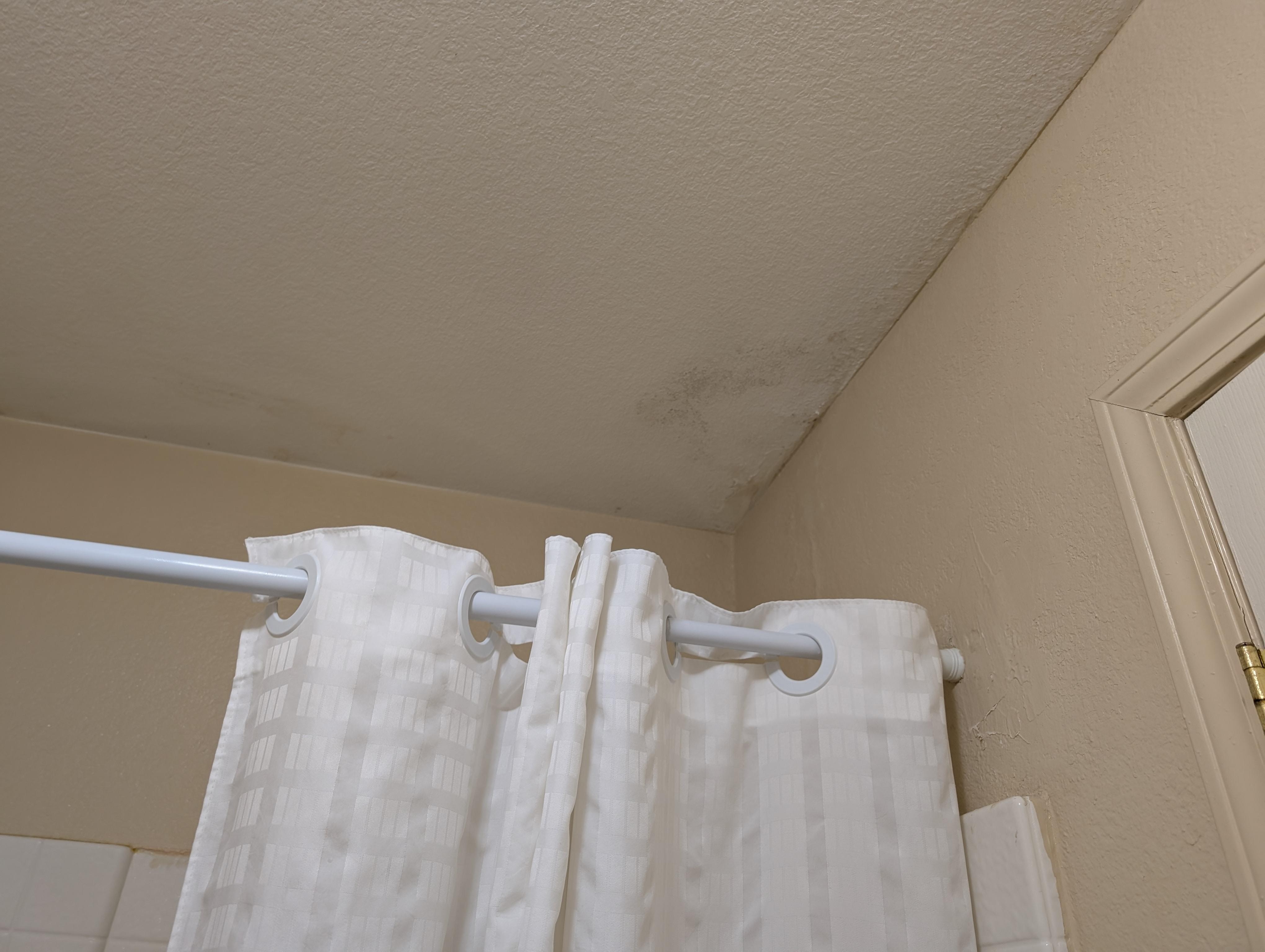 Water stains on ceiling of bathroom 