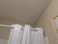Water stains on ceiling of bathroom
