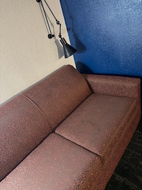 Broken light fixture on the wall.