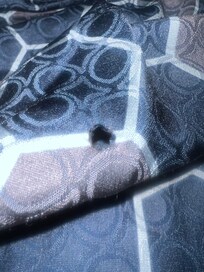 Nonsmoking room, burn hole in blanket