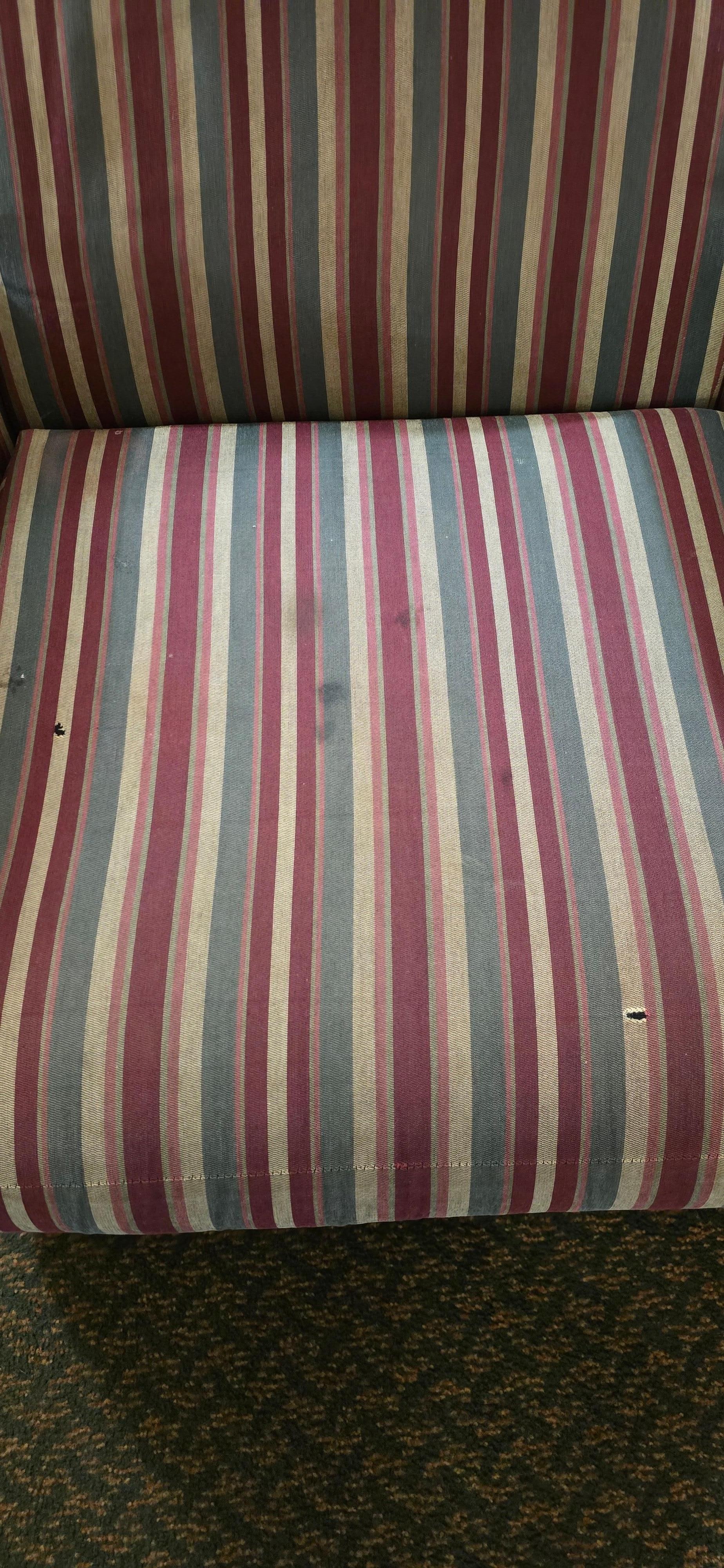 The ripped and stained chair in my room. 