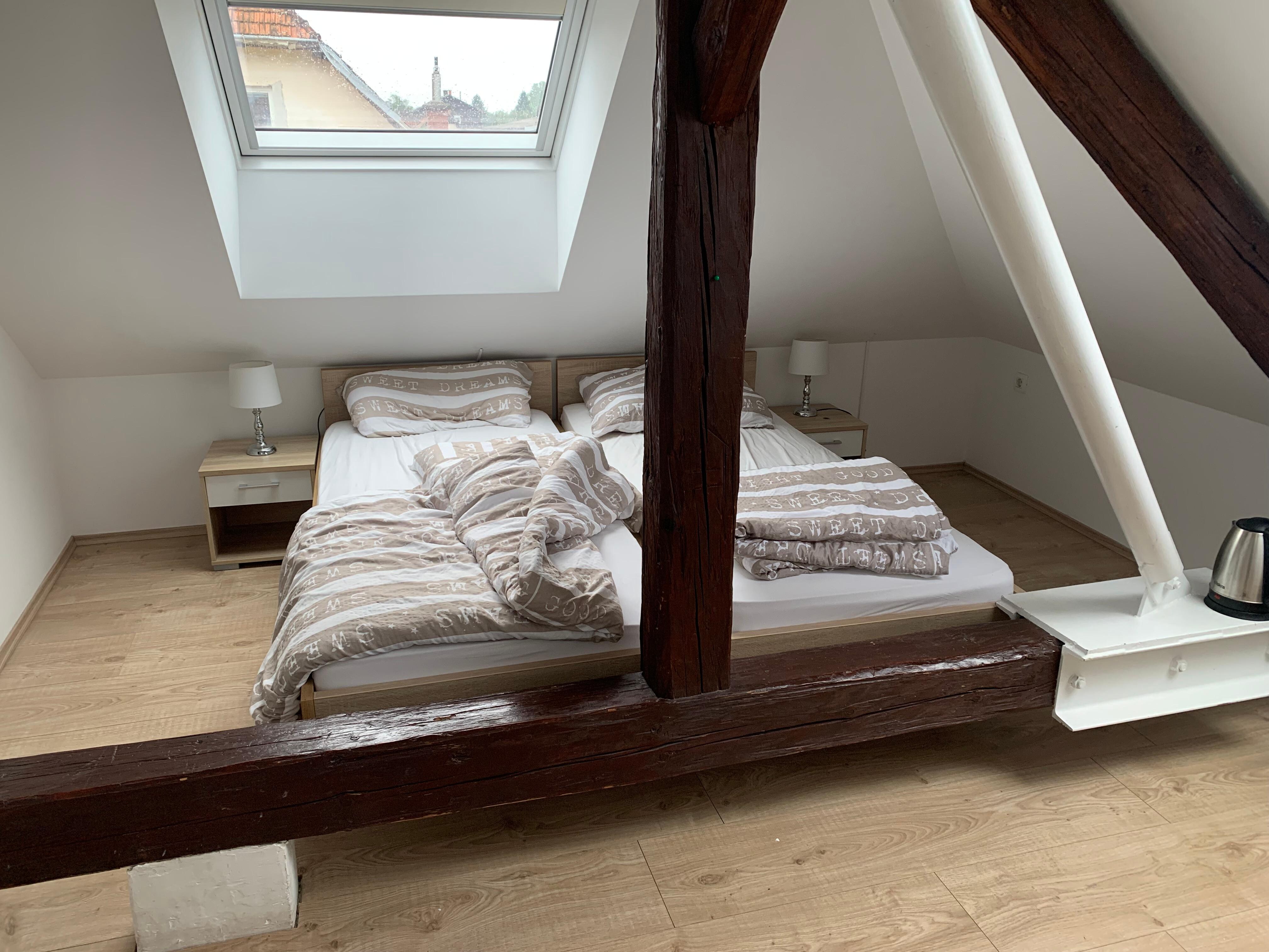 Have to step over a beam to get to bed