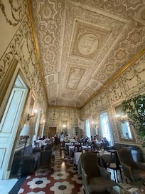 Breakfast room filled with yummy nibbles and happy to serve you staff.