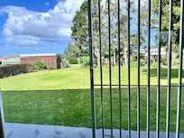 View of lawn area from our room