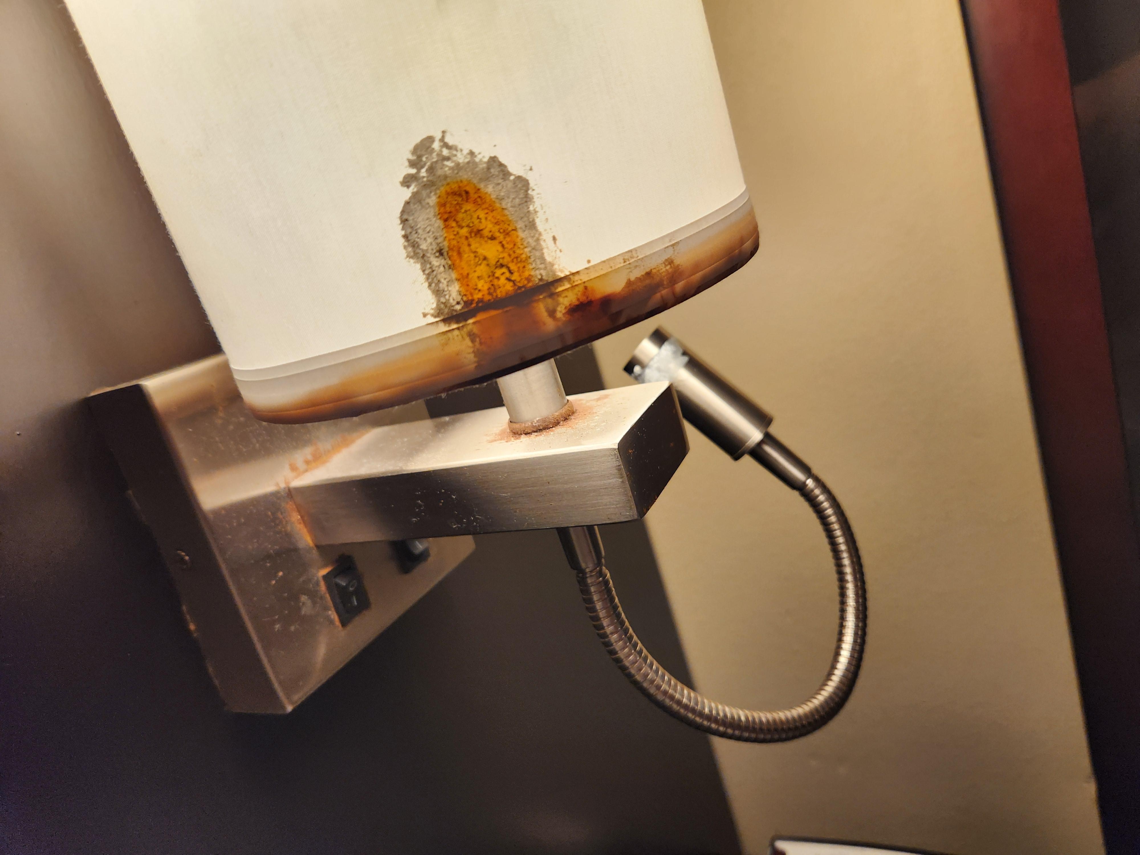 very rusty and nasty light at the bedside