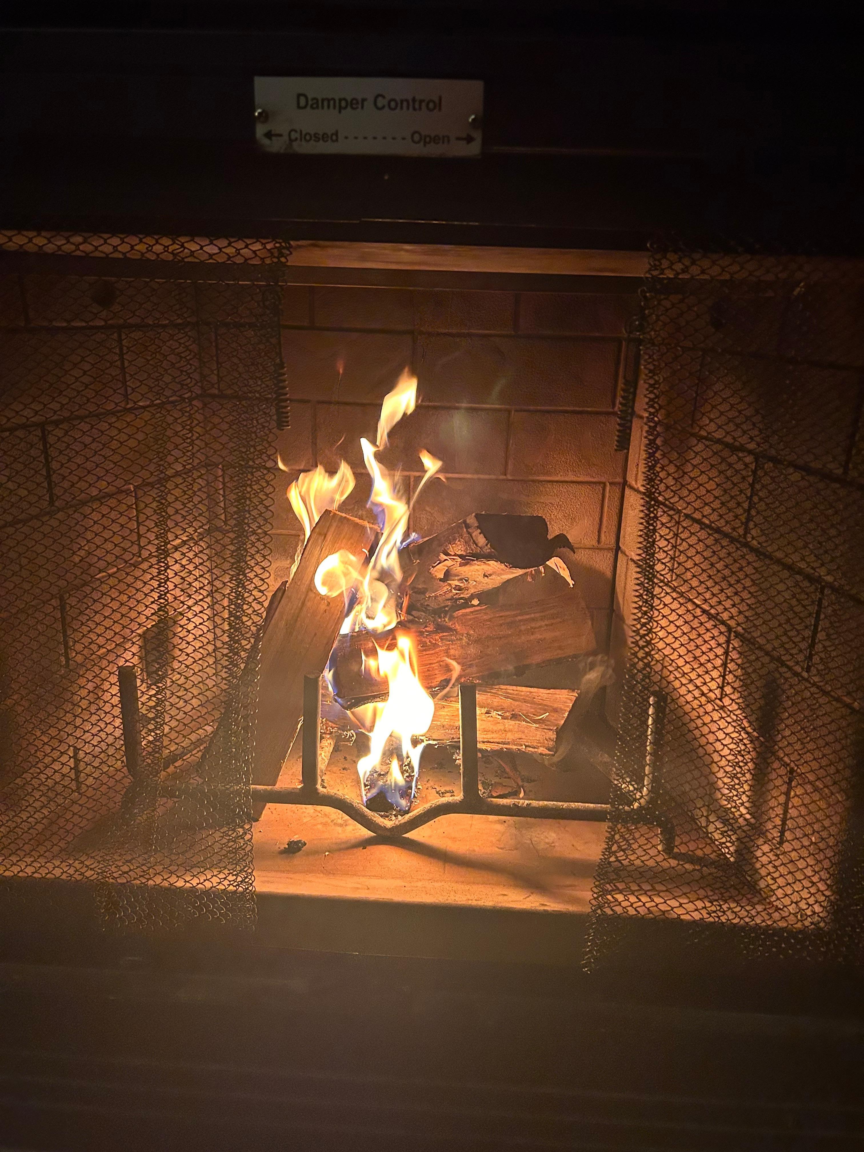 Real wood fireplace in room!