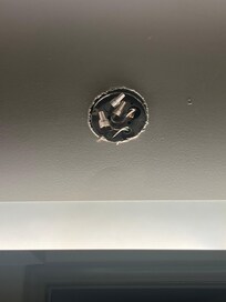Exposed wiring in bathroom