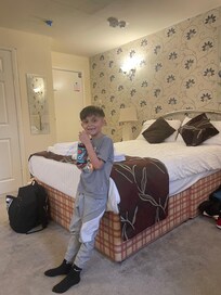 Family room double bed , two singles and private bathroom