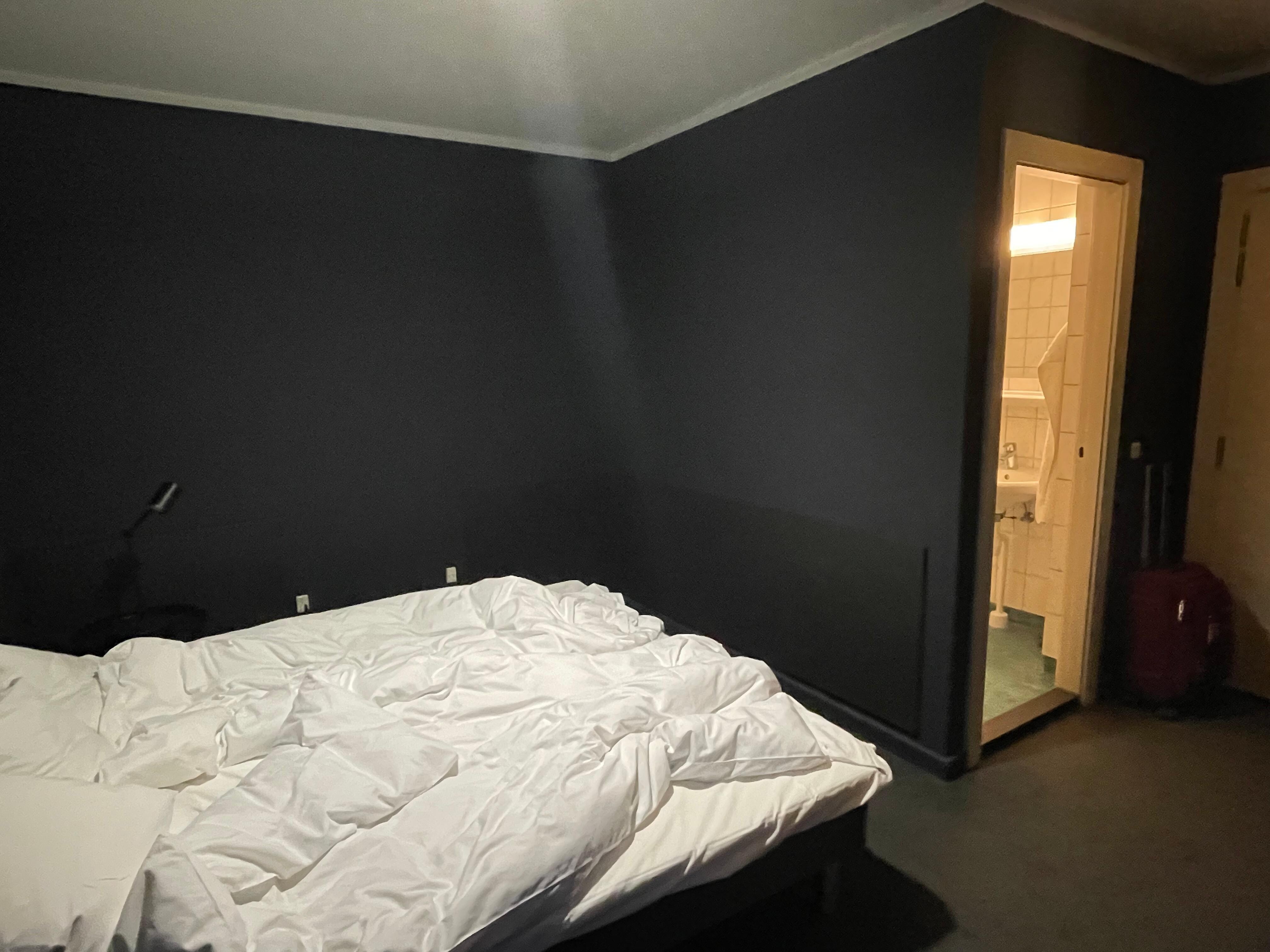 Totally black walls and floors without a single soothing detail for your eyes. 