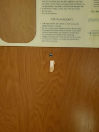 Bandaid under peep hole on door