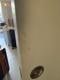 Hand prints on bathroom door