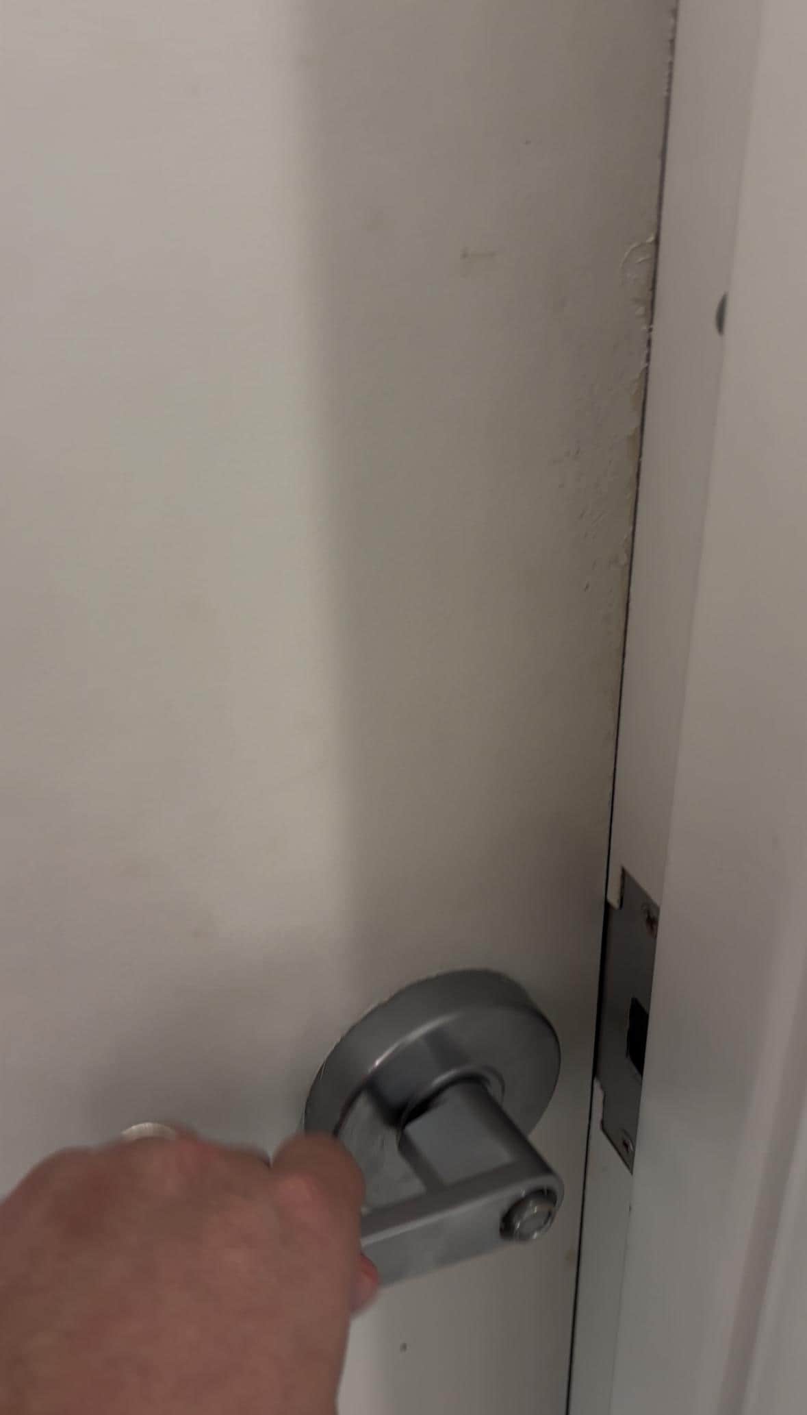 The bathroom door was crooked and would not shut. 