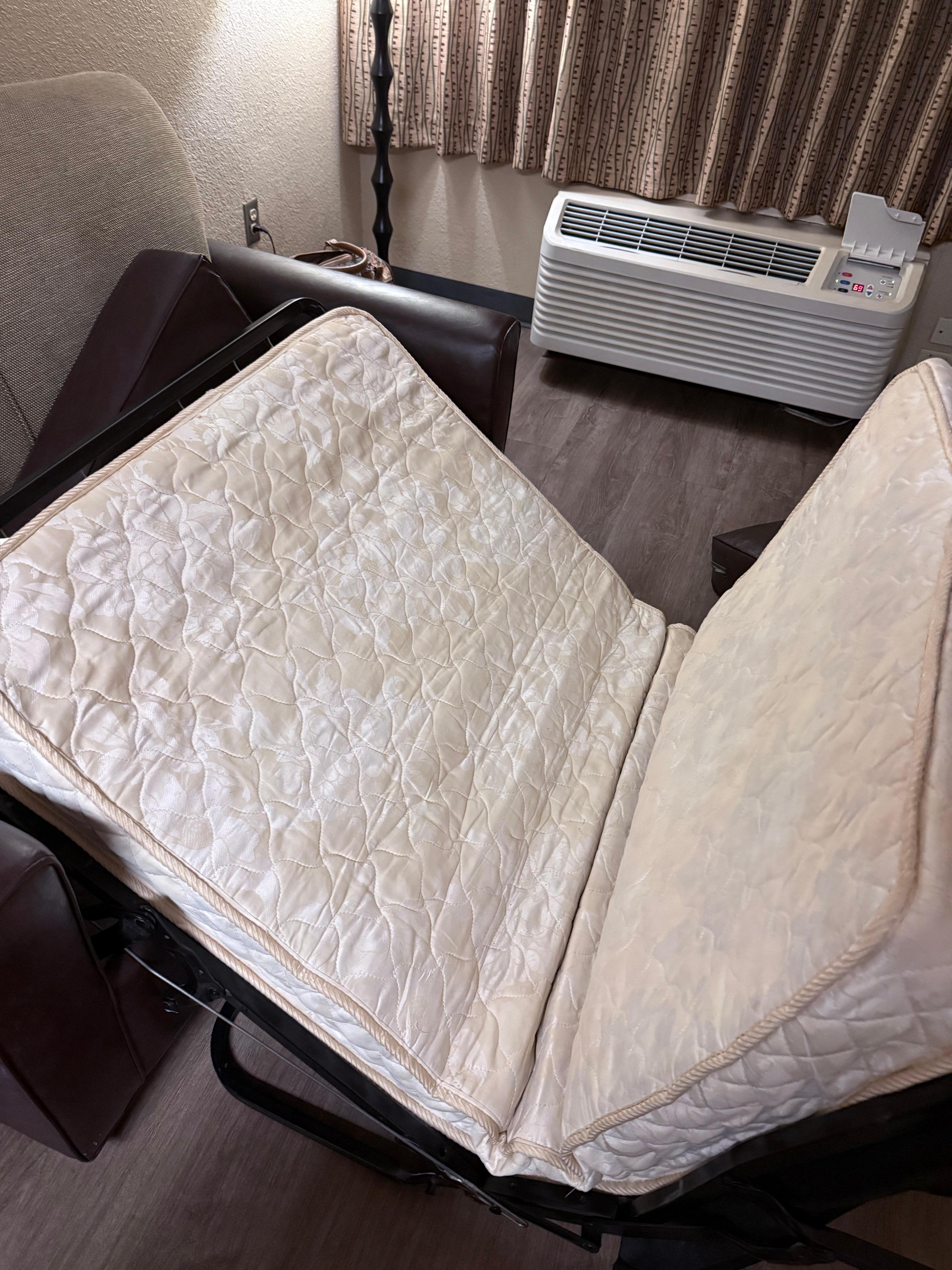 The soiled mattress of the sofa bed. Sheets cost extra. 