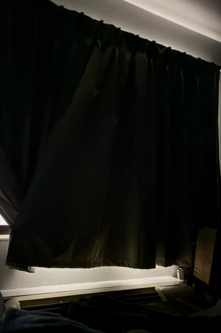 Light coming in at night from very bright parking lot and in the daytime making it difficult to sleep with light coming in around curtains. 