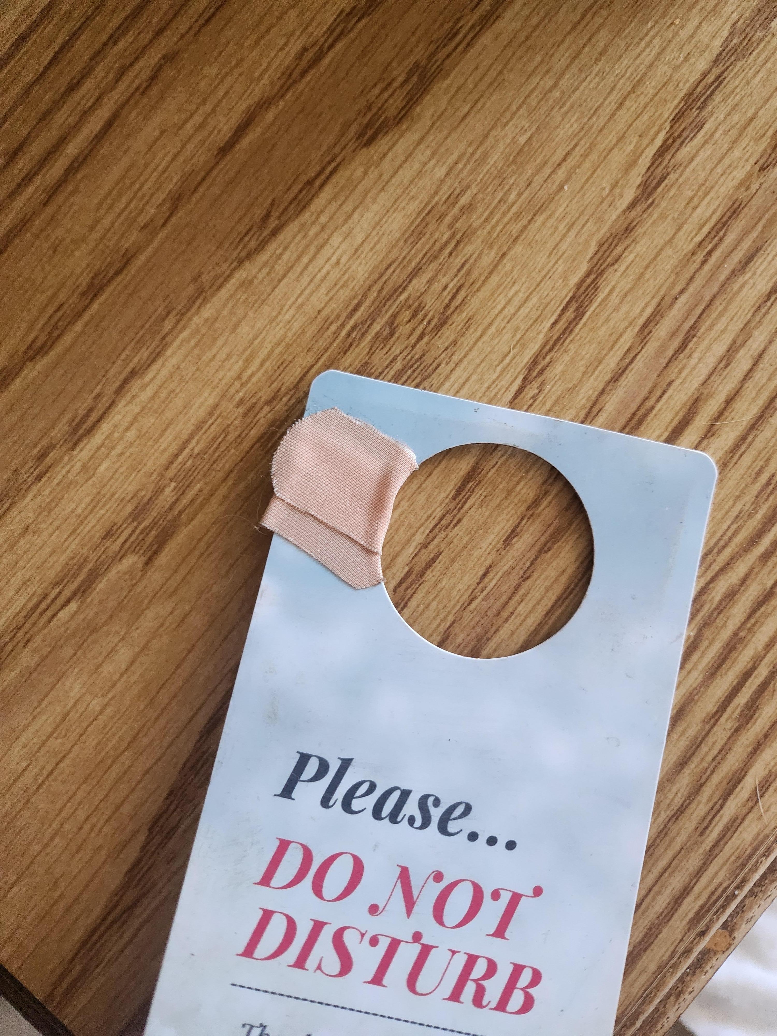 Band aid repaired DND sign