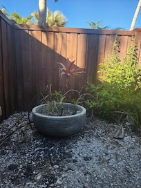 Horrible patio area. Loaded with weeds.