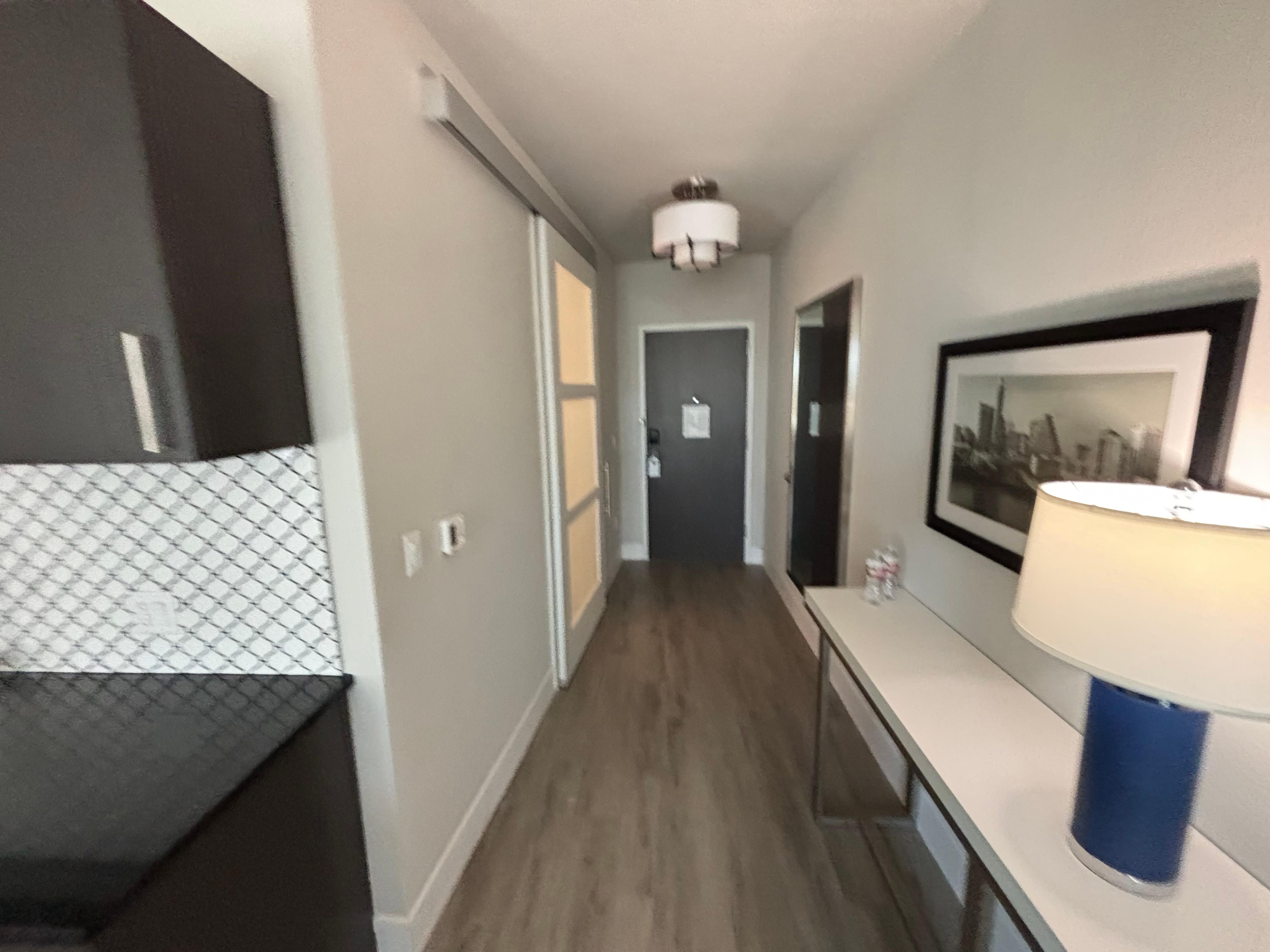 Hallway to separate private bathroom