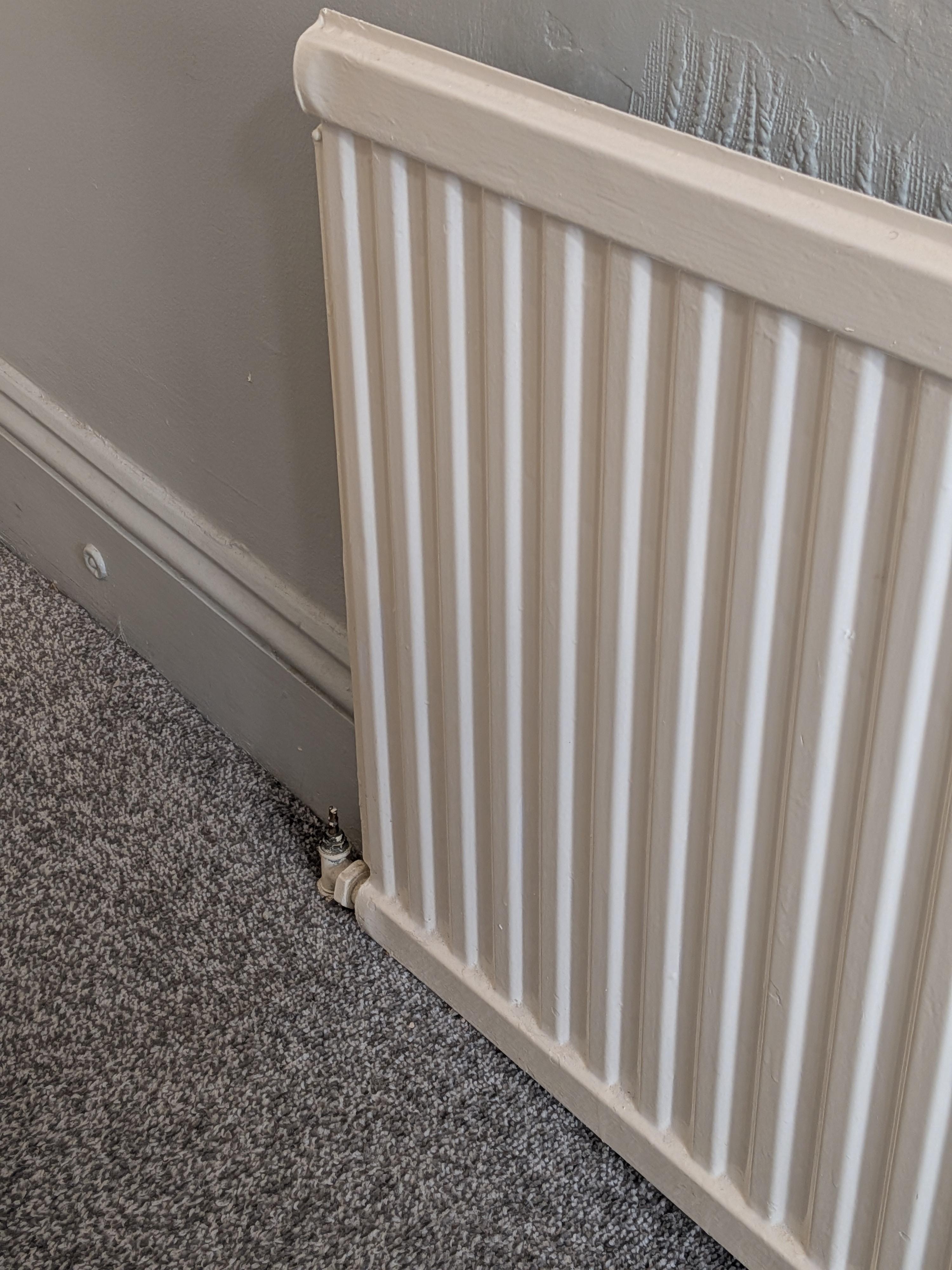 Radiator fallen off wall