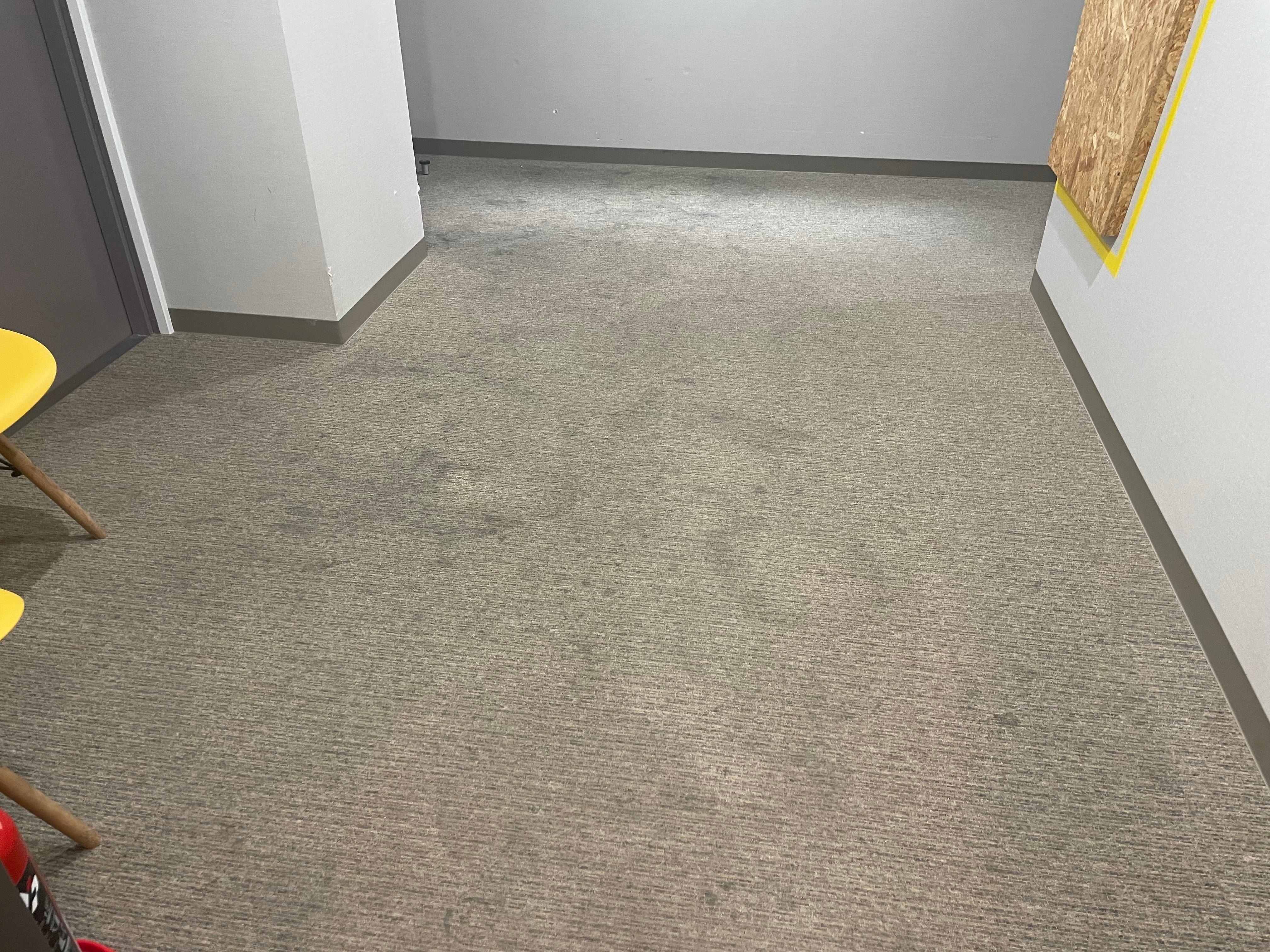 This stained carpet will greet you in 6F elevator.